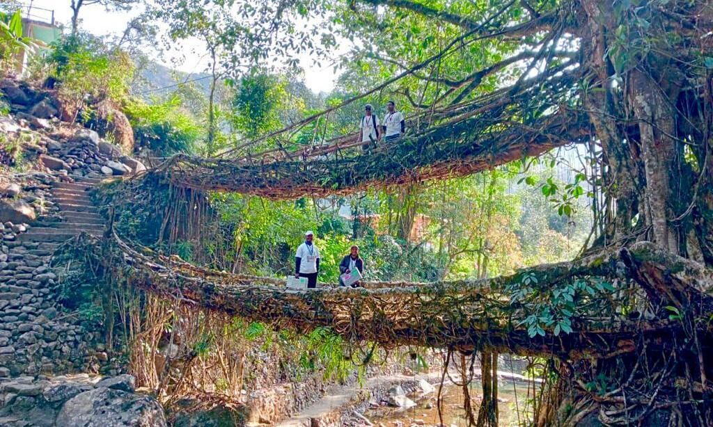 Poll officials heading towards polling station across the iconic double ...